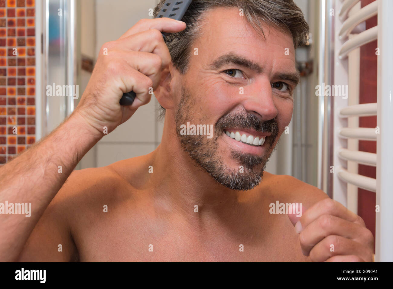 Man combing hi-res stock photography and images - Alamy