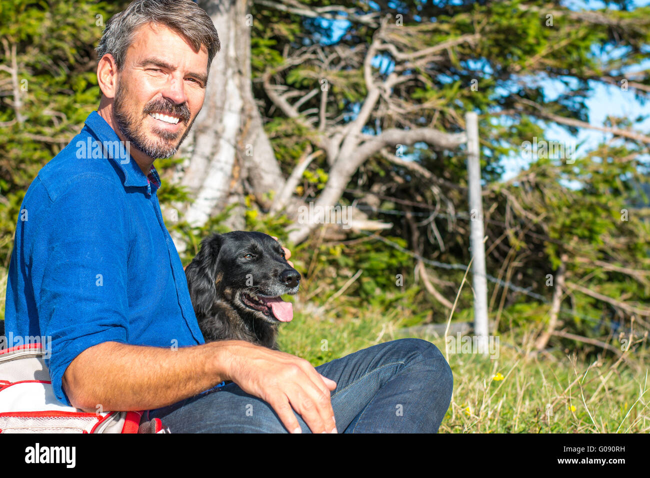 Man having a break while hiking Stock Photo - Alamy