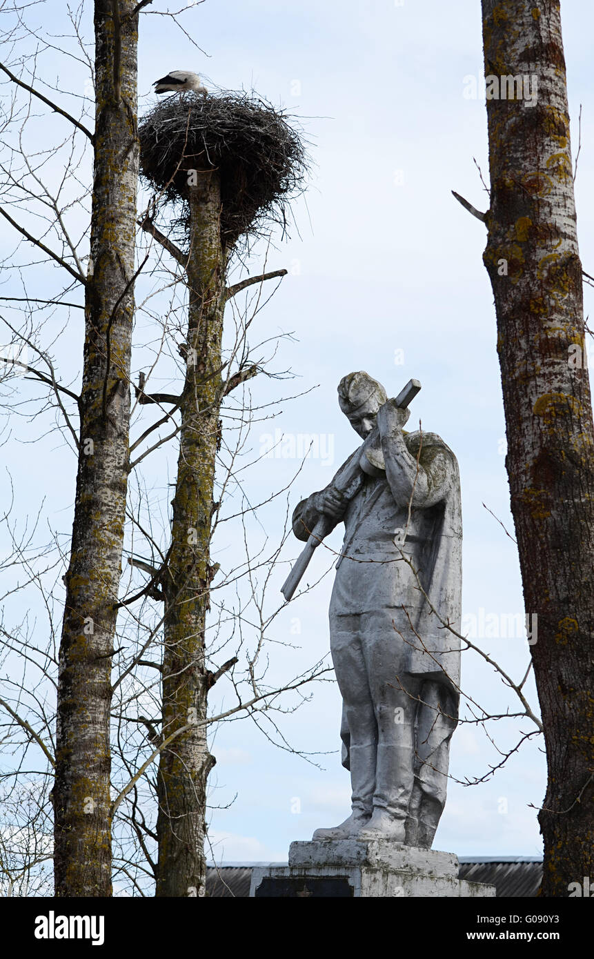 Stork in a nest at a monument to the soldier Stock Photo - Alamy