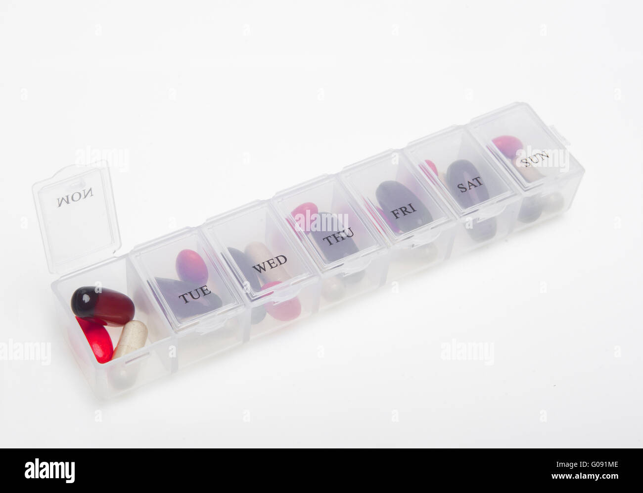 Pill box with variety of pills Stock Photo - Alamy
