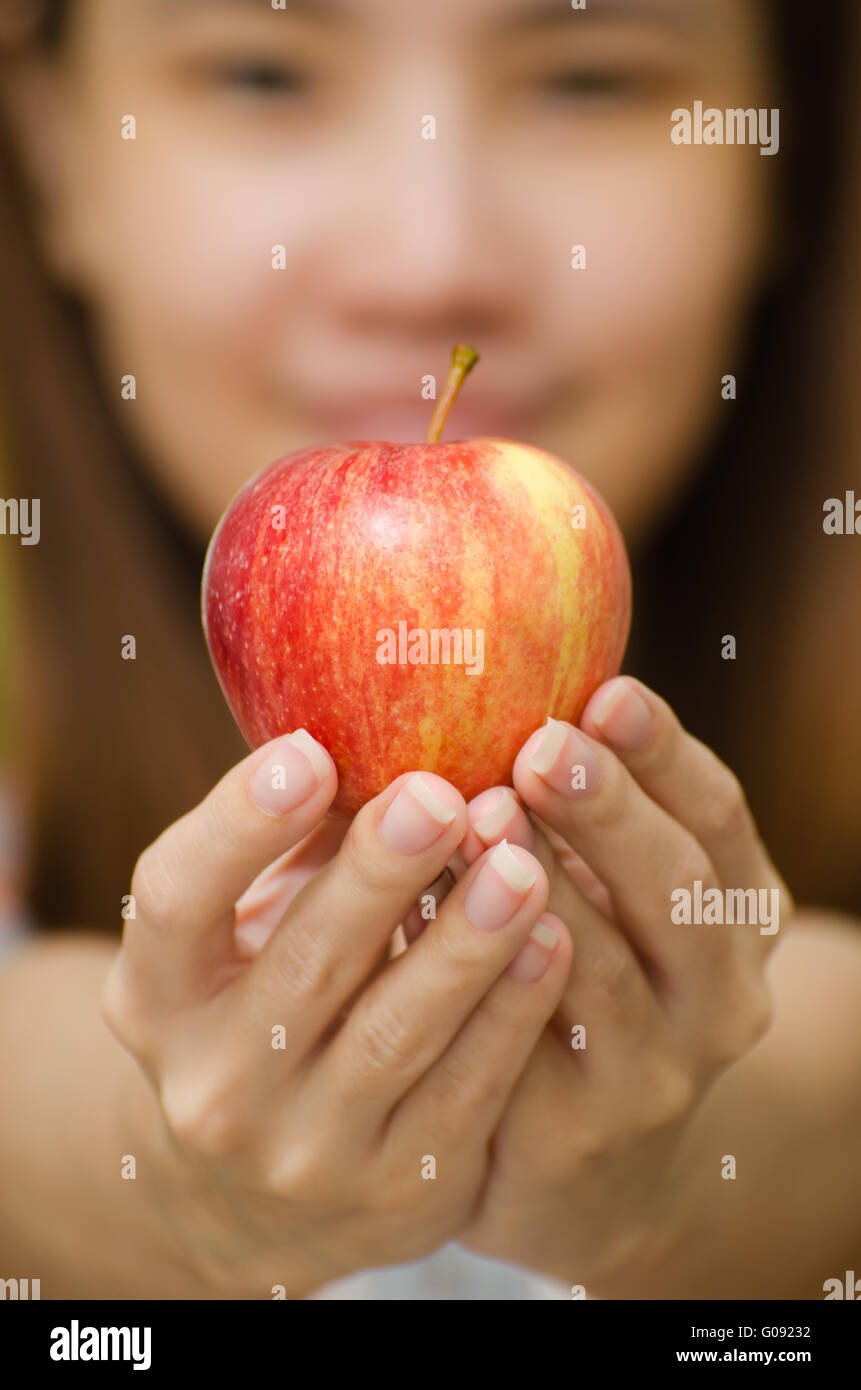 Thai Girl and apple Stock Photo - Alamy