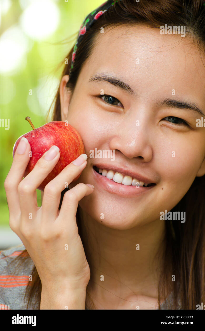 Thai Girl and apple Stock Photo - Alamy
