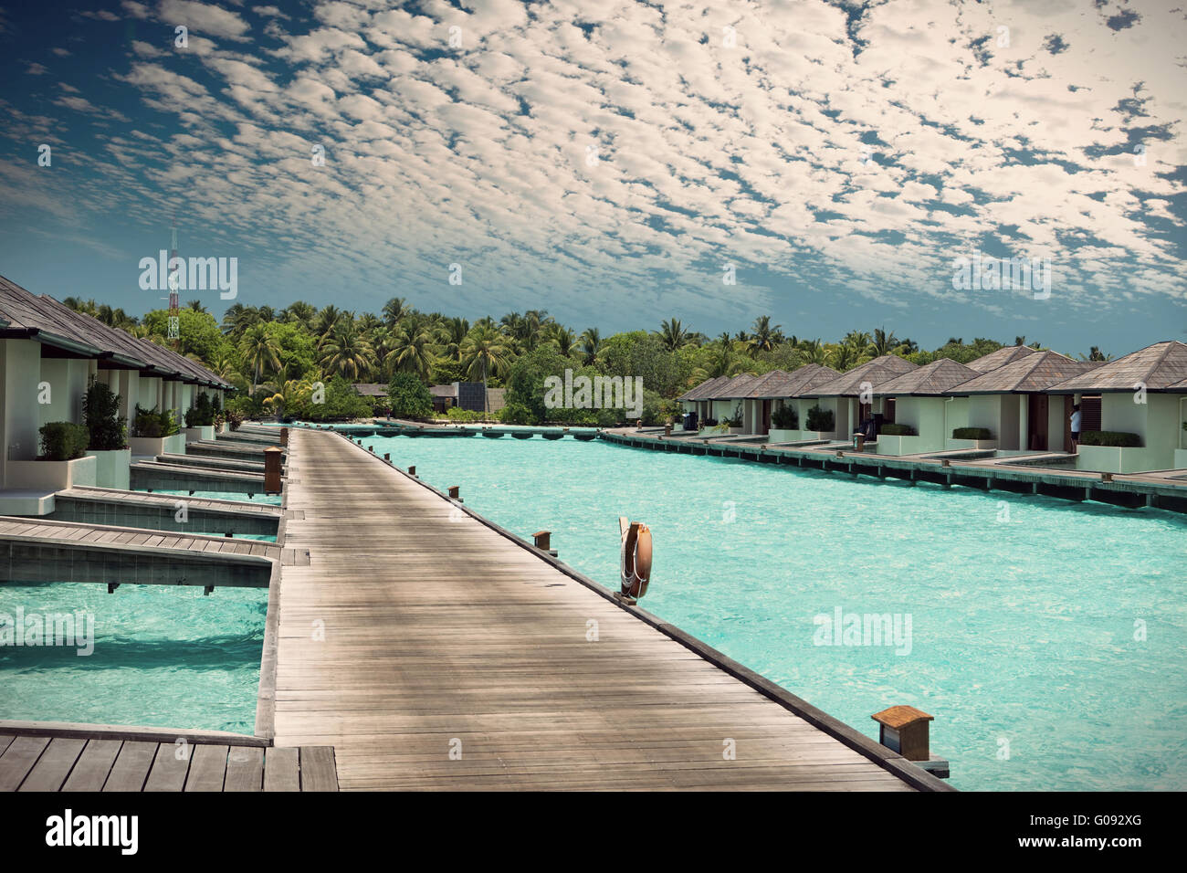 houses on piles on sea. Maldives.,with a retro eff Stock Photo - Alamy
