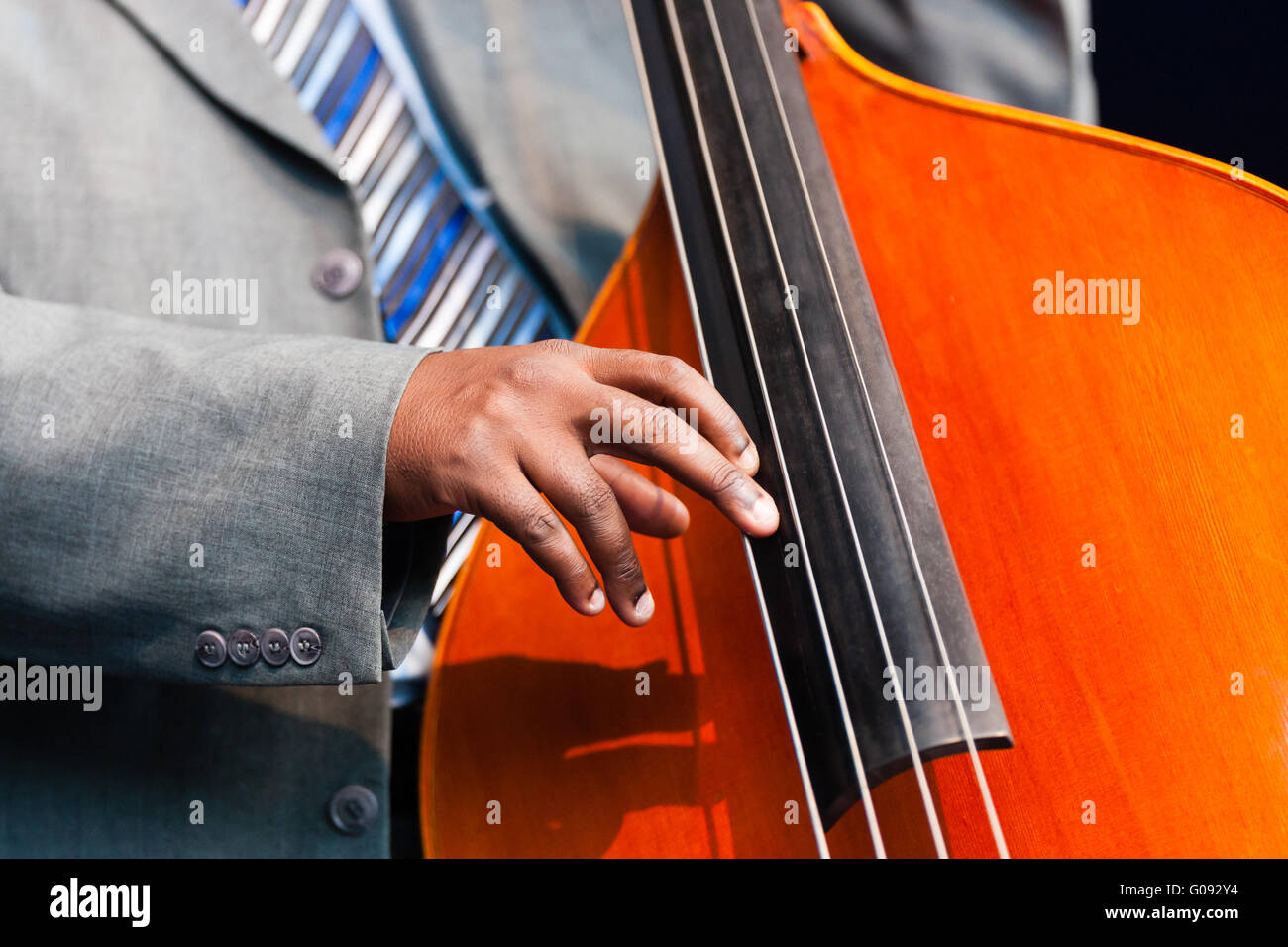 Man playing a double bass in an orchestra Stock Photo - Alamy