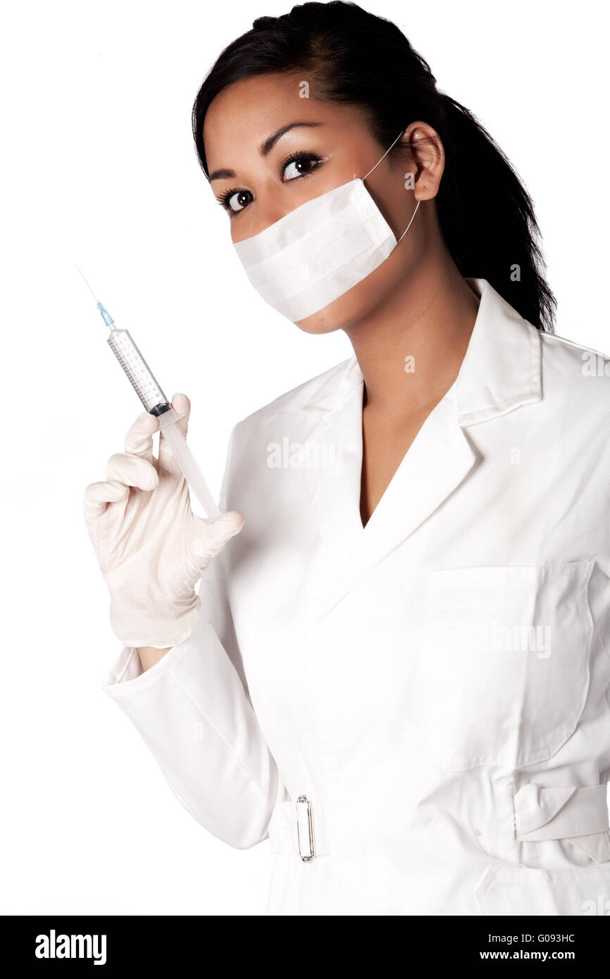 Beautifull Indonesian nurse with cap and serenge Stock Photo - Alamy