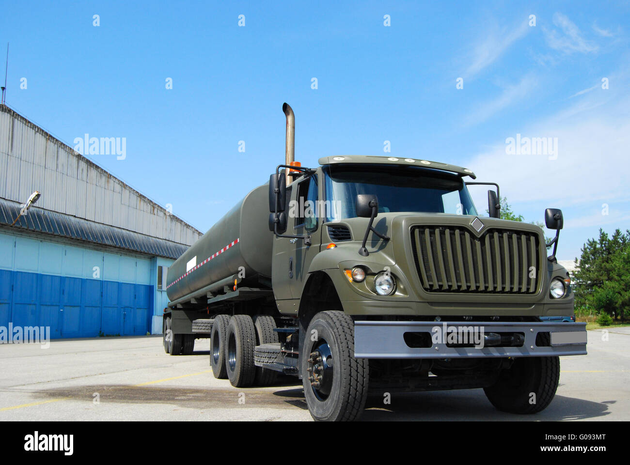 Military truck in front of military base hall Stock Photo - Alamy