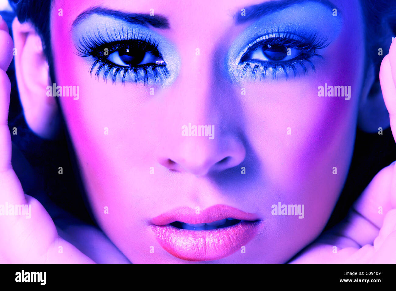 Saturated extreme make-up mixed race girly girl Stock Photo - Alamy