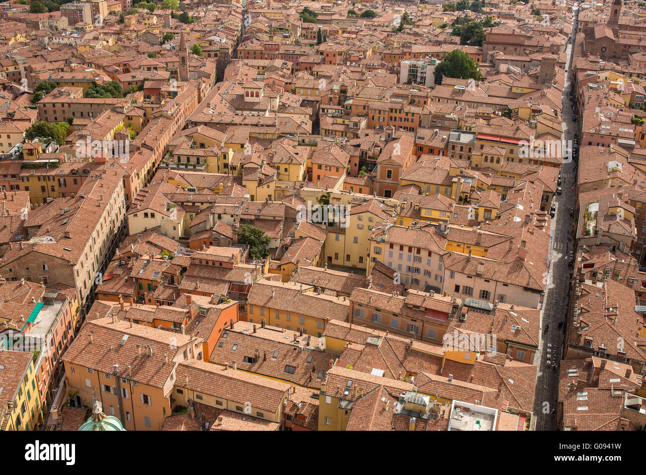 Aerial view of red tiled rooftops and ancient towers in historical ...