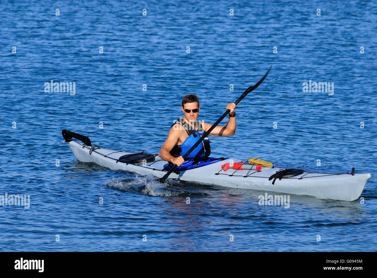 Atheltic man kayaking in Mission Bay Stock Photo - Alamy