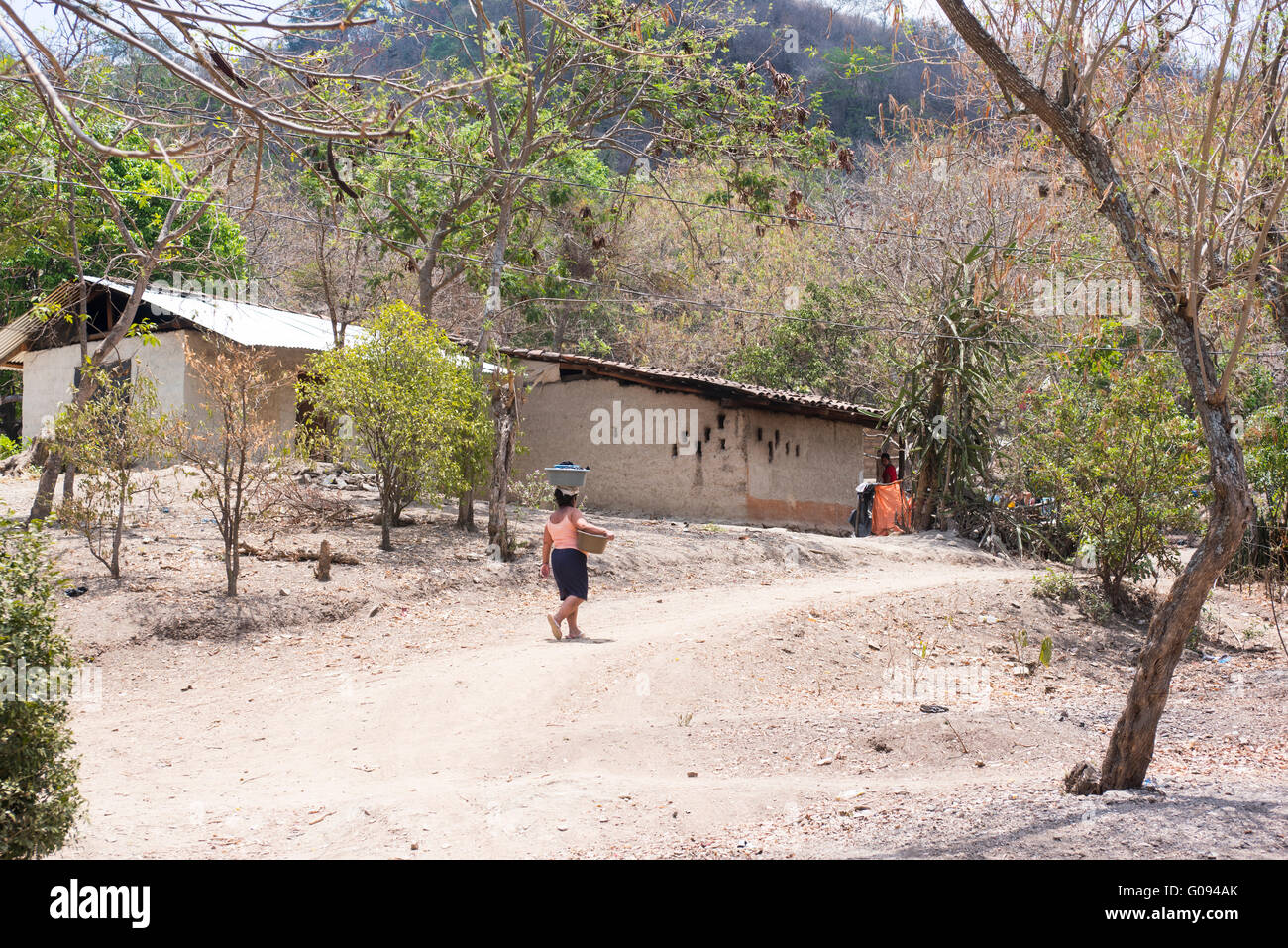 Woman carrying water nicaragua hi-res stock photography and images - Alamy