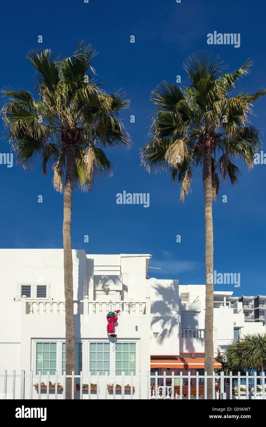 Santa Claus under the palm trees Stock Photo - Alamy