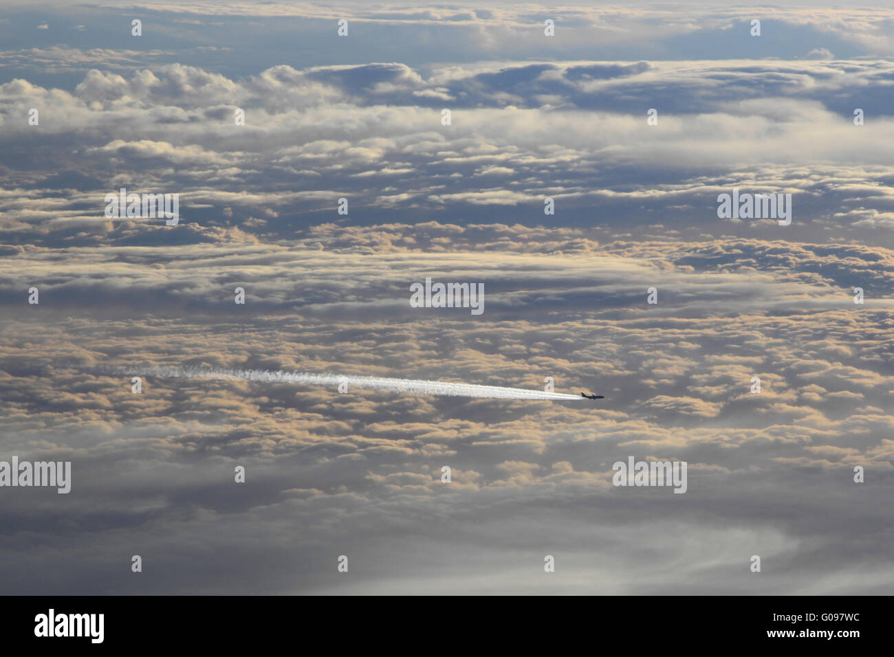 Plane contrail coloured hi-res stock photography and images - Alamy