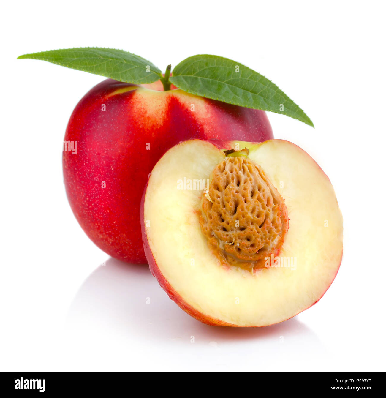 Ripe peach (nectarine) fruit with slices isolated on white Stock Photo ...