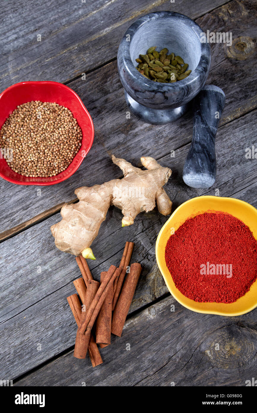 Still-life with ginger and cinnamon on an old kitchen table Stock Photo ...