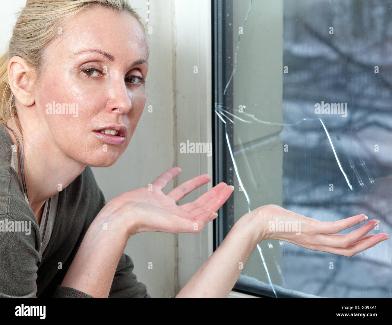 the bad quality double-glazed window has burst bec Stock Photo - Alamy