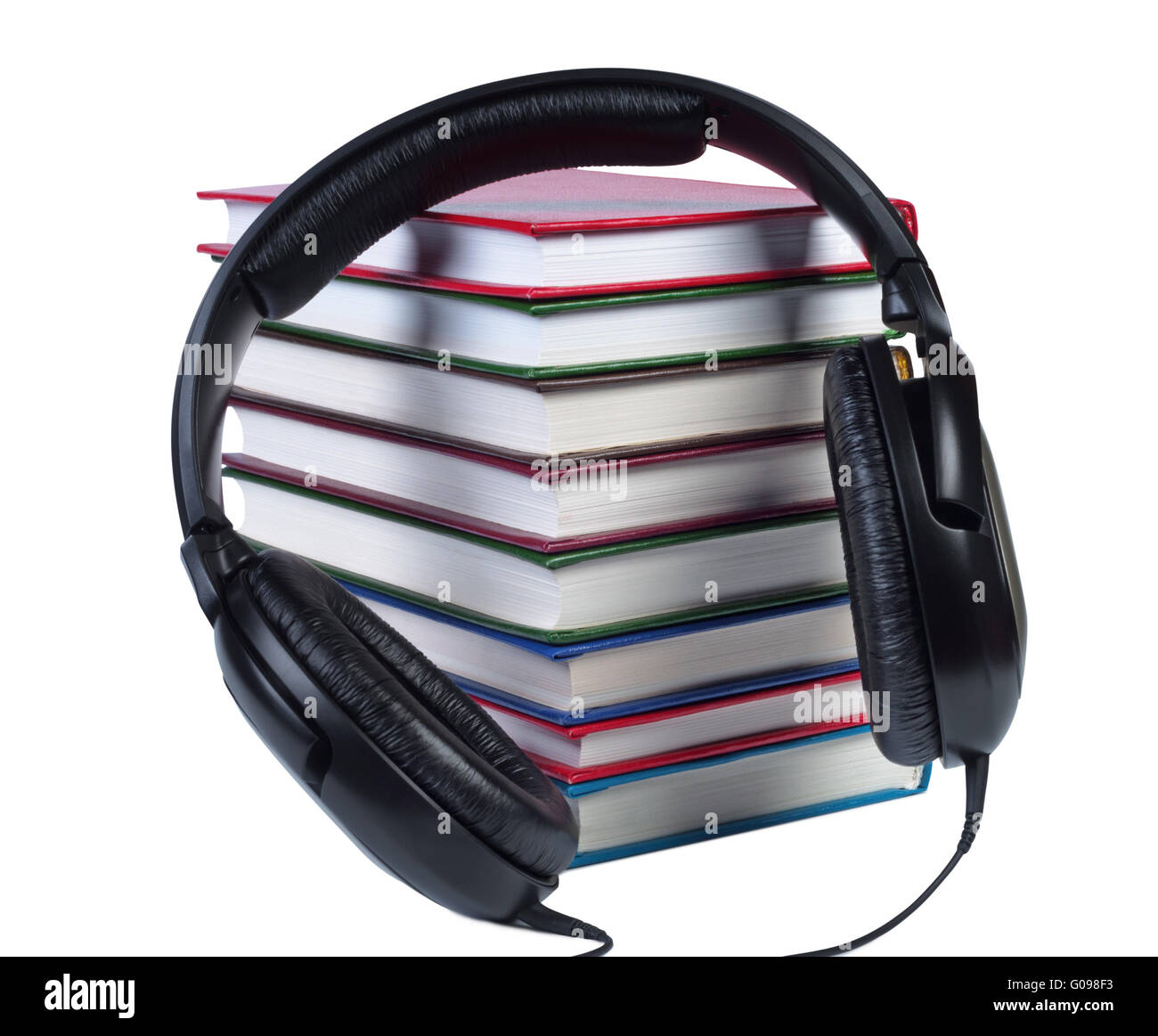Audio headphones on a pile of books with color covers Stock Photo - Alamy