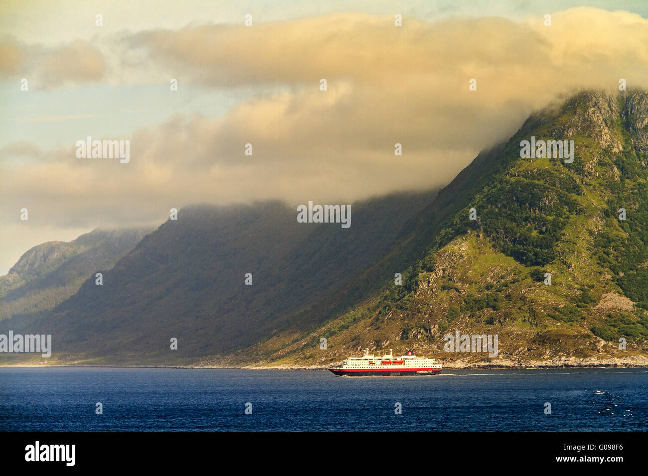 The Hurtigruten Ferry Crossing The Fjord Alesund N Stock Photo - Alamy