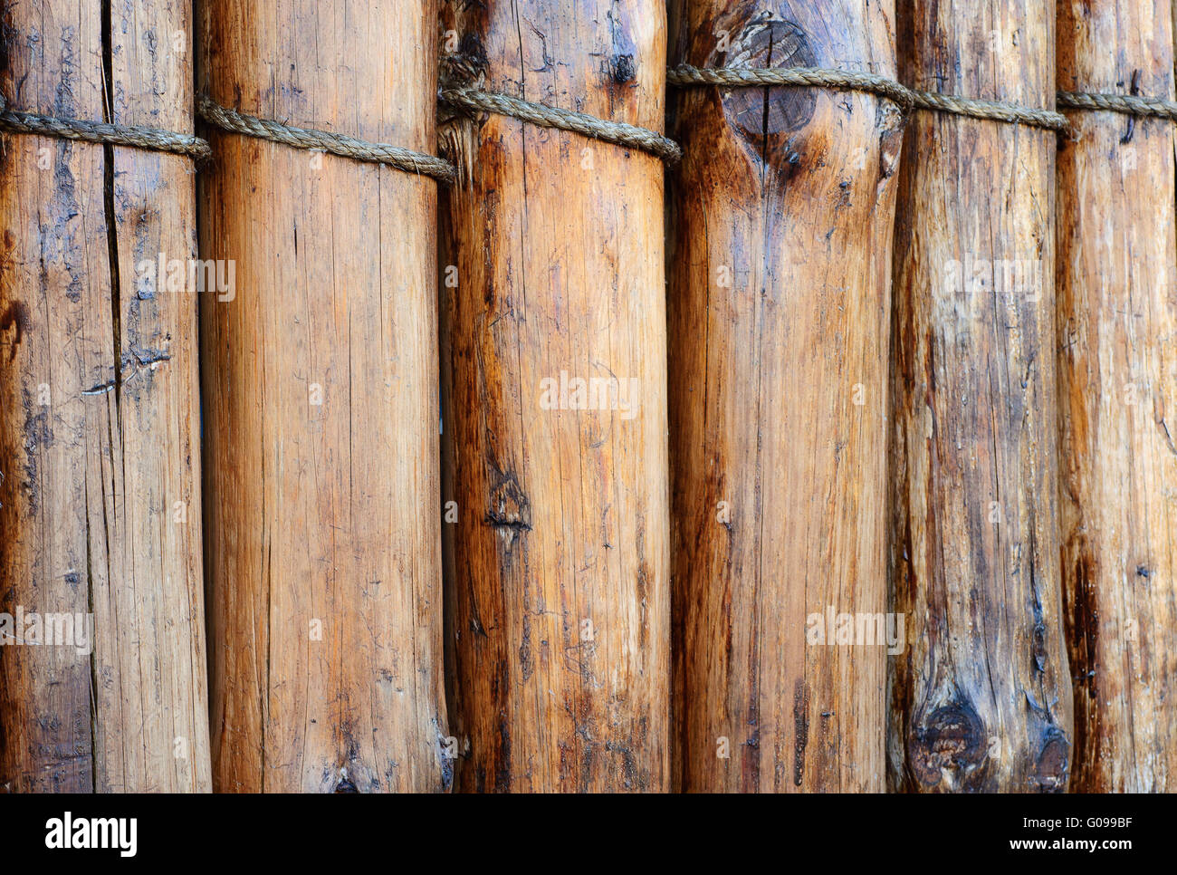 A fence made of logs Stock Photo - Alamy