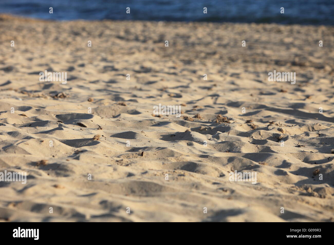 Beach sand texture Stock Photo - Alamy
