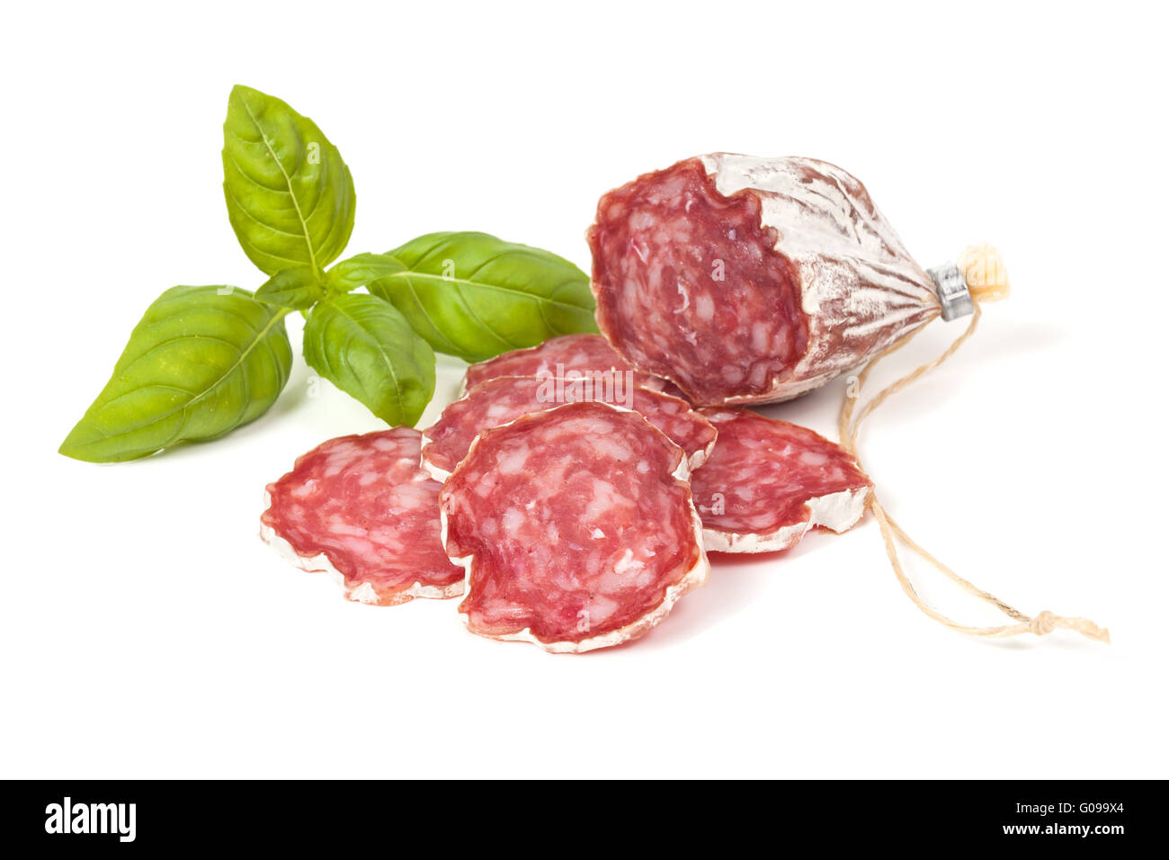 Salami sliced on the white background Stock Photo - Alamy