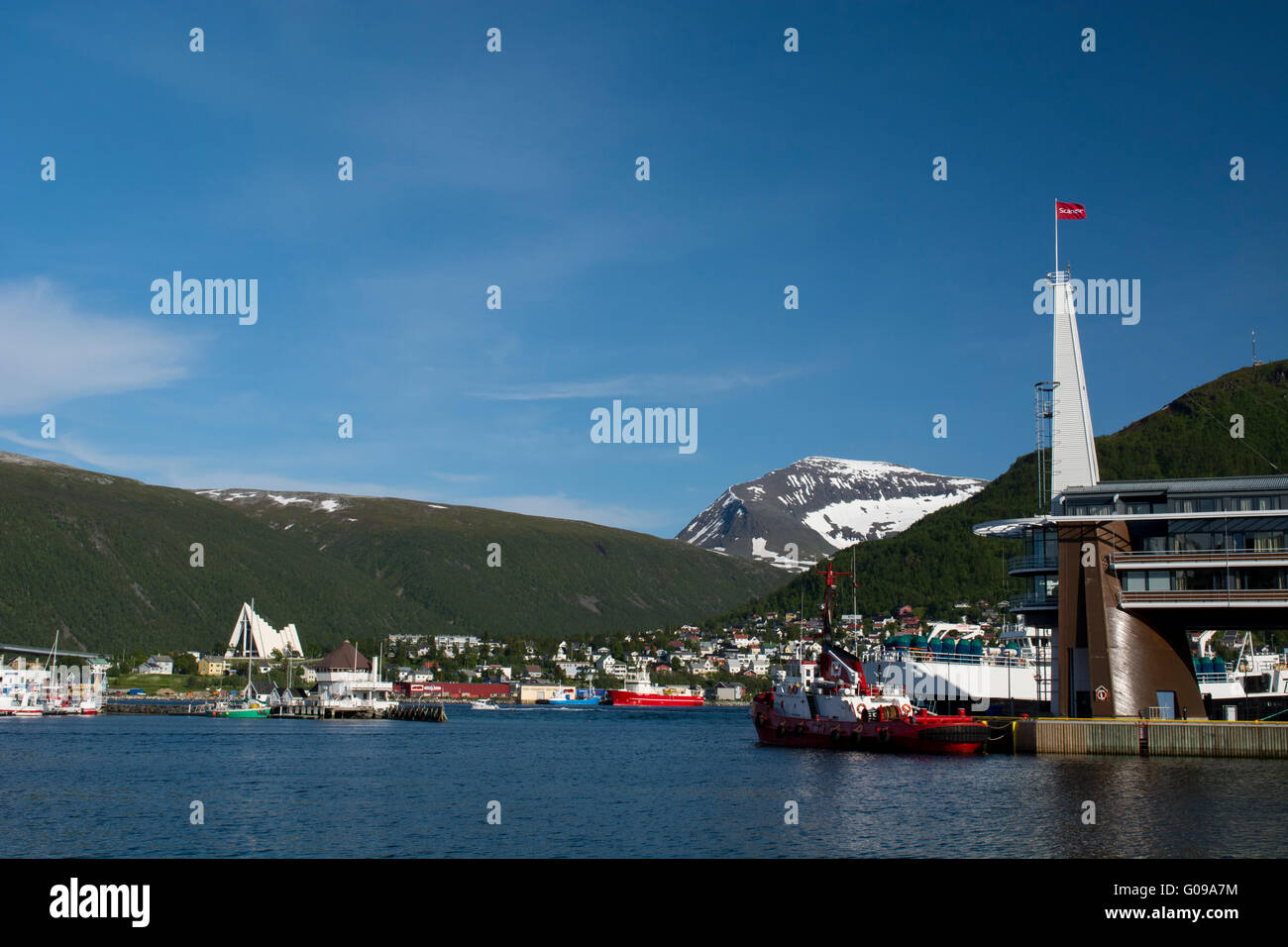 Norway, Tromso. Harbor area and waterfront view, Arctic Cathedral in ...