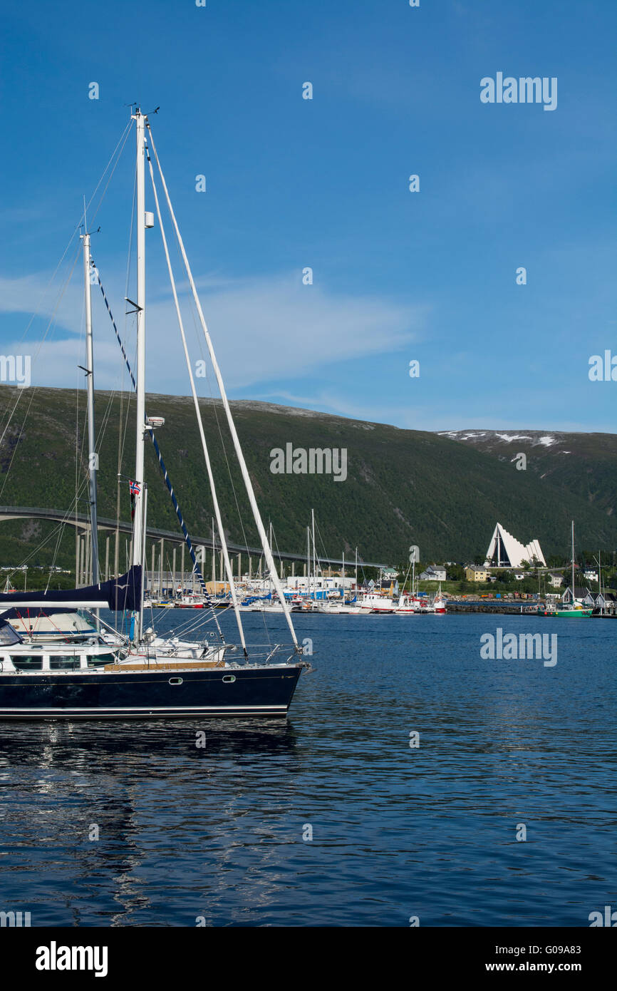 Norway, Tromso. Harbor area and waterfront view, Arctic Cathedral in ...