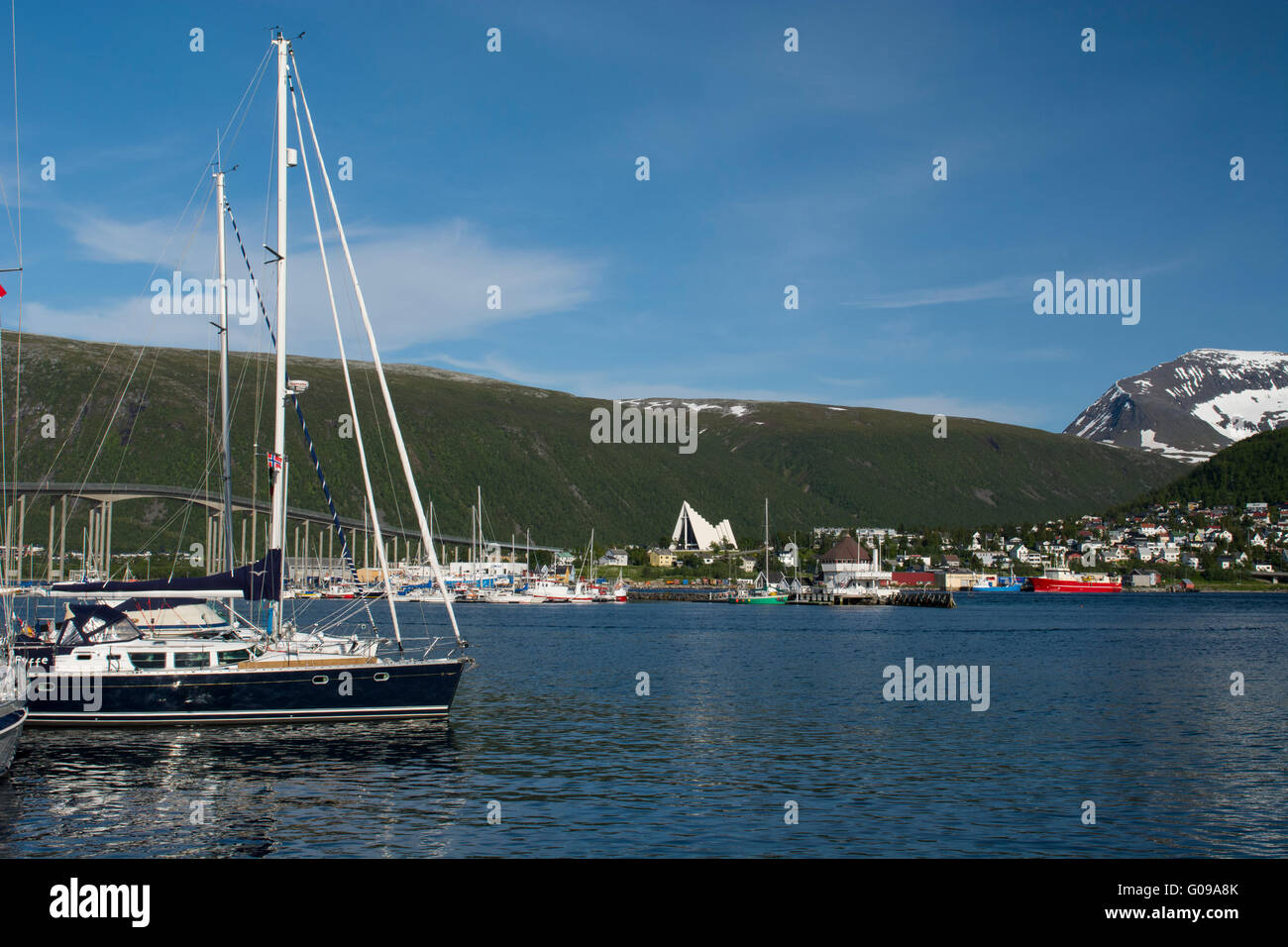 Norway, Tromso. Harbor area and waterfront view, Arctic Cathedral in ...