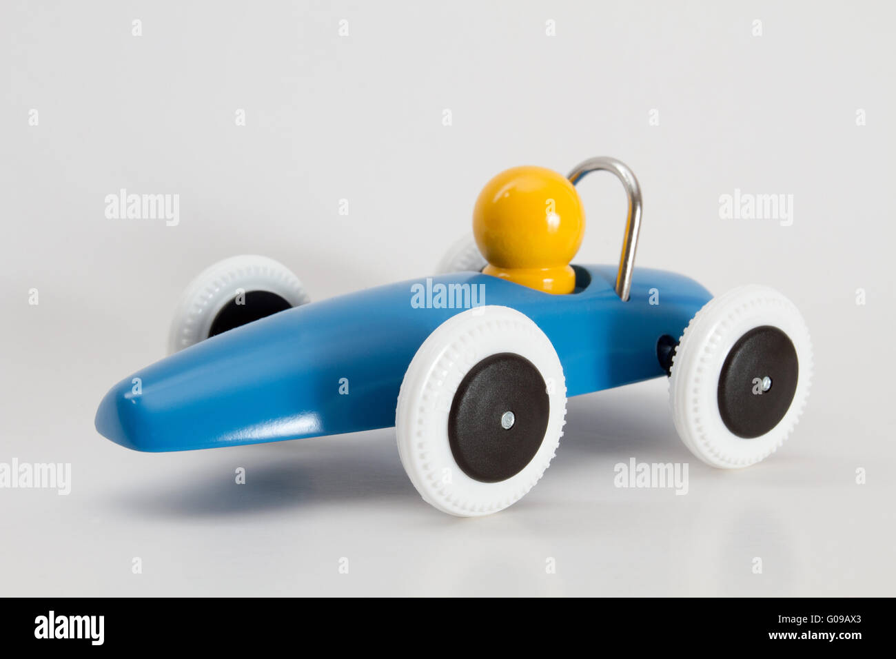 Blue race car with yellow driver isolated with discreet shadow Stock ...