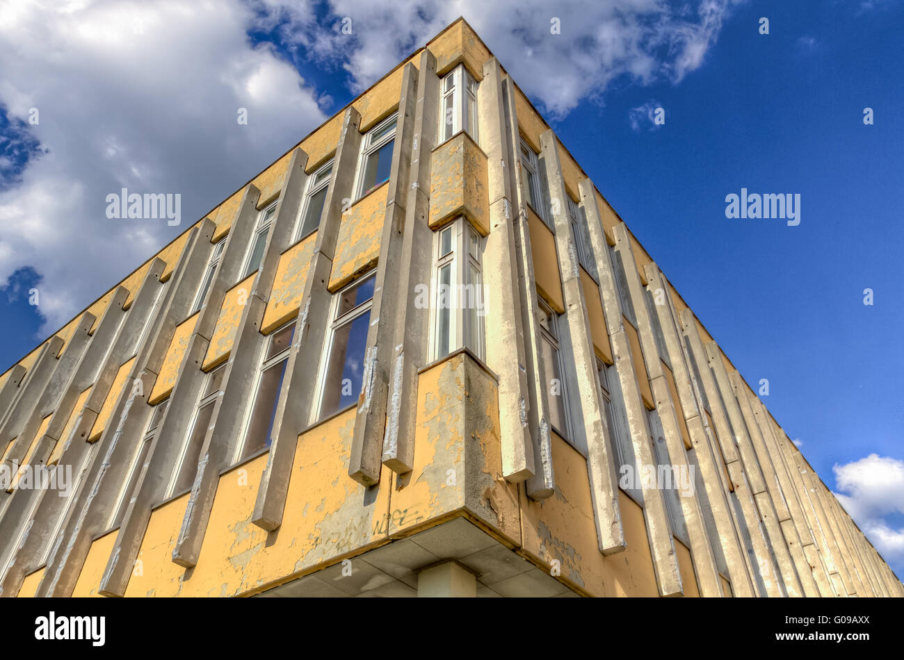 Run-down building with blue sky and clouds HDR Stock Photo - Alamy
