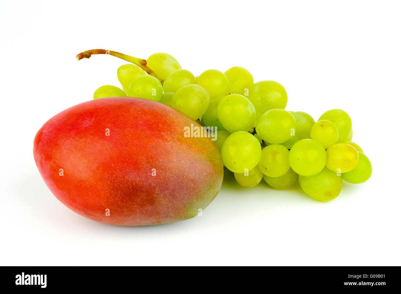 Mango and green grapes Stock Photo - Alamy