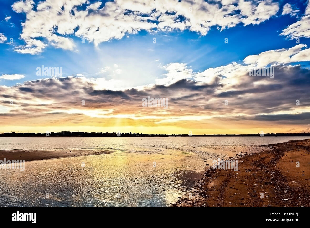 Sunset on the Tejo river Stock Photo - Alamy