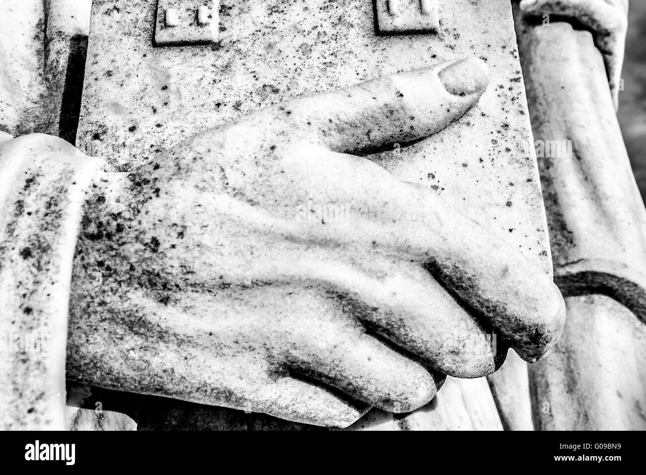 Stone Hand with Book Stock Photo - Alamy