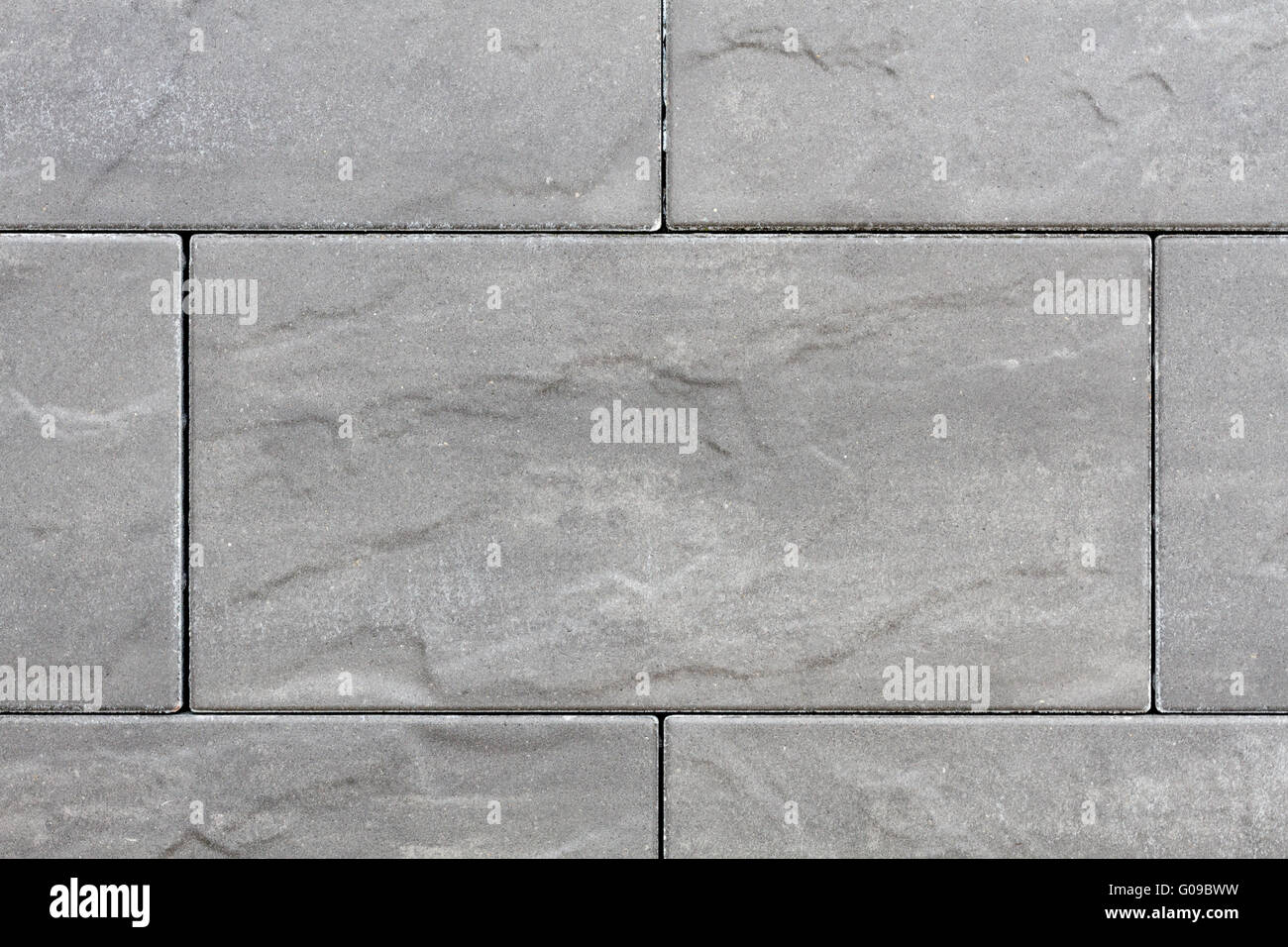 Stone plates in grey on a sideway with seams Stock Photo - Alamy
