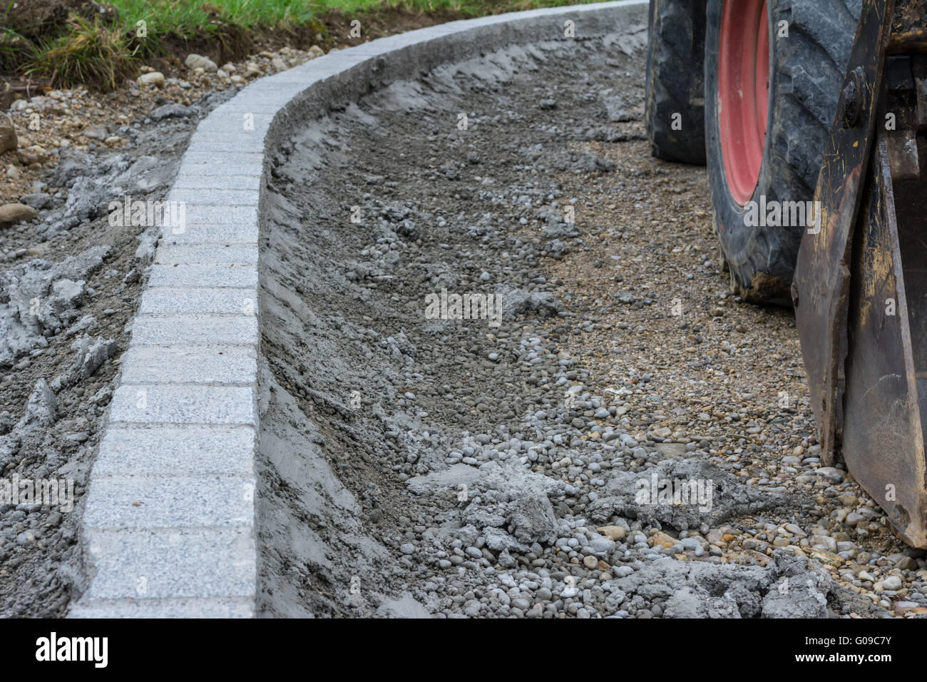 Road works – building curbstones Stock Photo - Alamy
