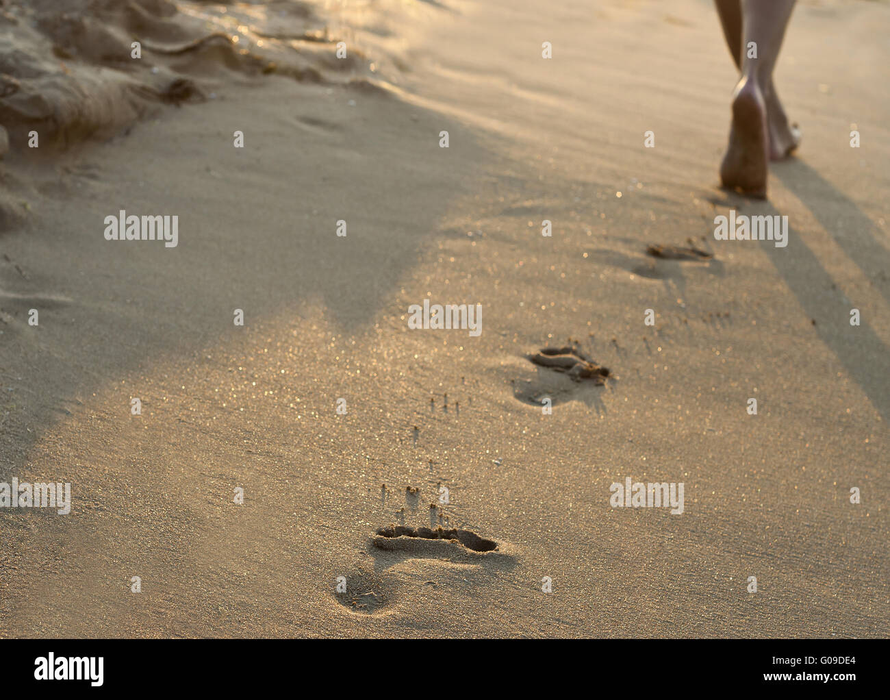 Walking on the sand Stock Photo - Alamy
