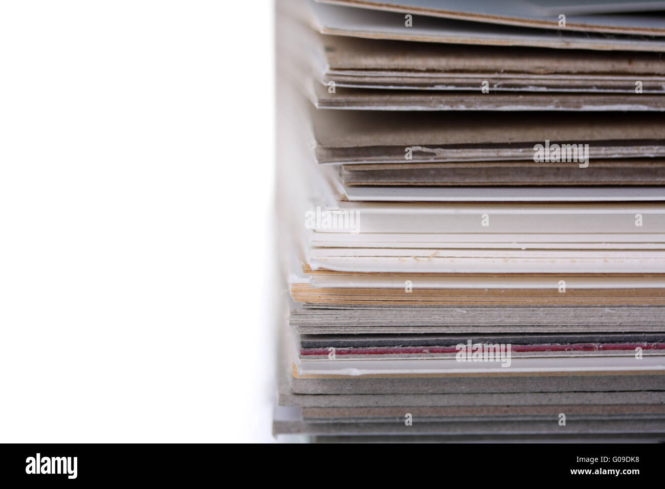 separating stacked sheets to organize a folder Stock Photo - Alamy