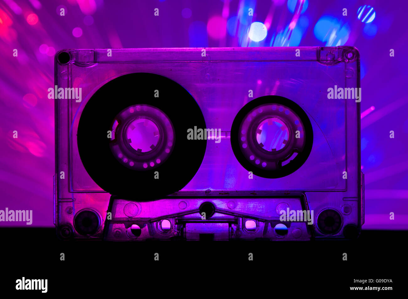 Transparent Cassette tape and disco light background Stock Photo - Alamy