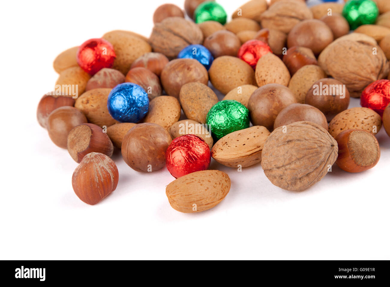 Nuts with colorful chocolate balls Stock Photo - Alamy