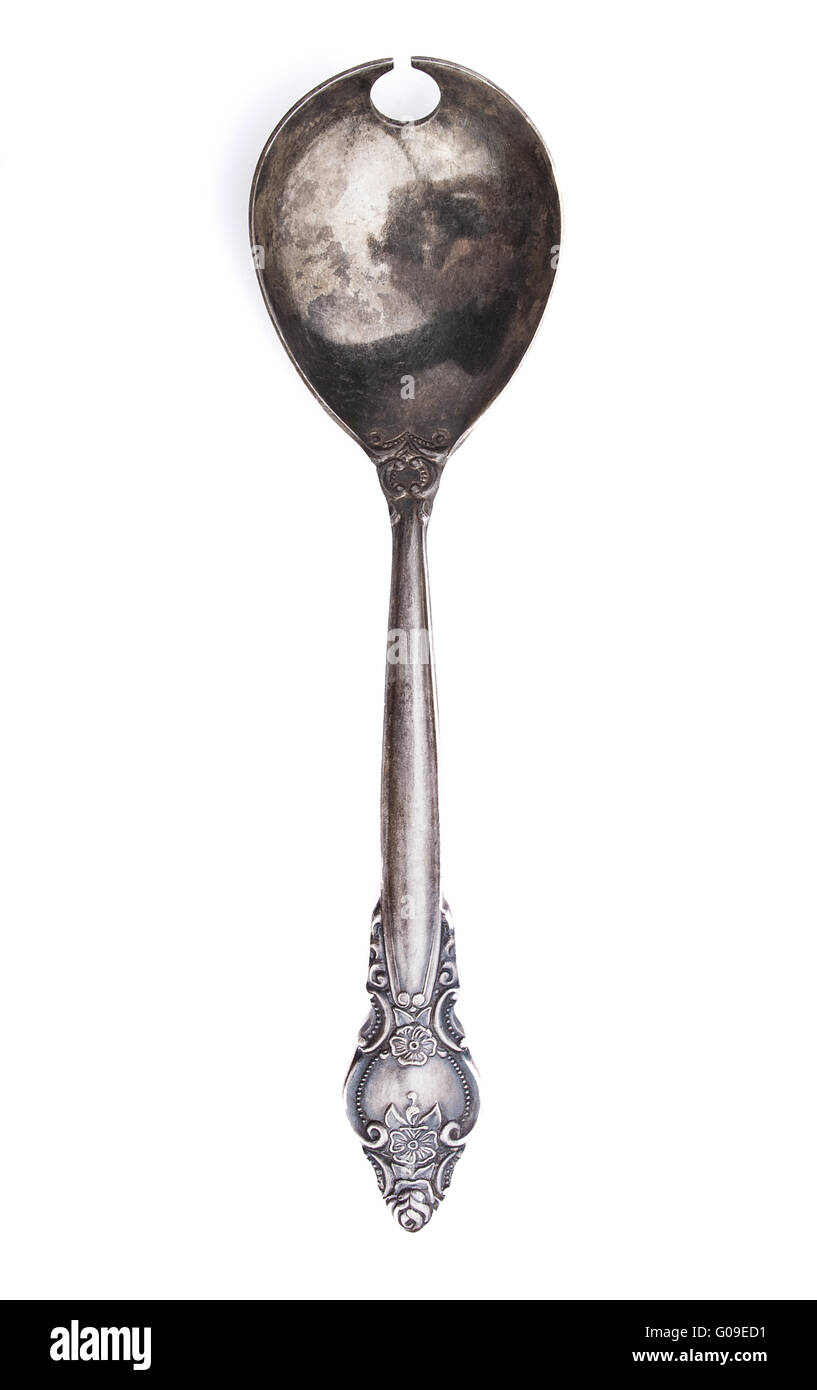 Retro old silver spoon isolated on white background Stock Photo - Alamy