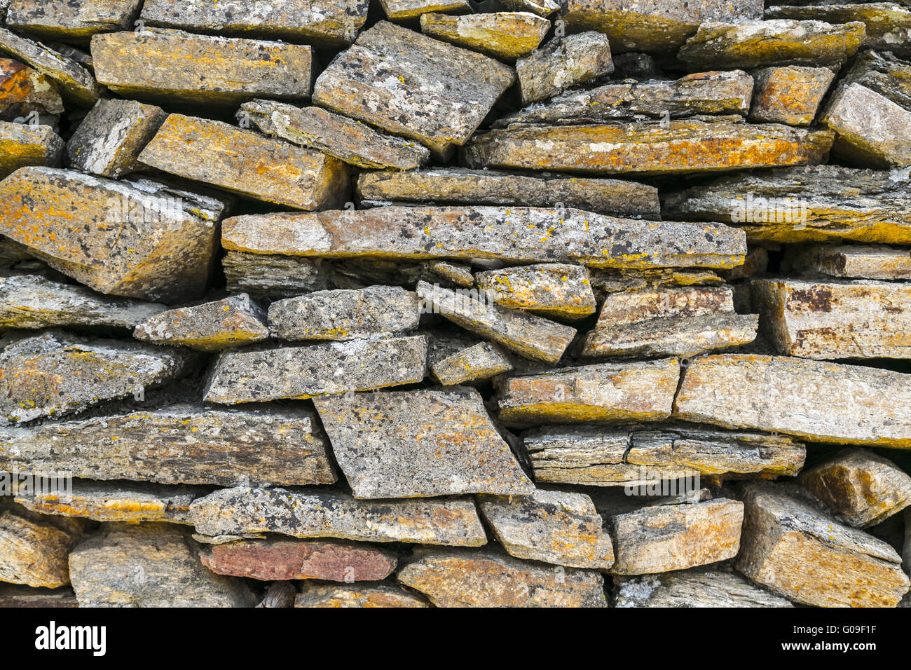 ancient natural stone wall pattern background Stock Photo - Alamy