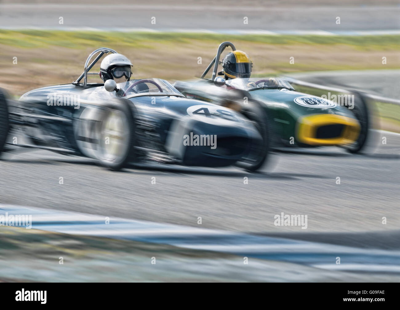 Vintage racing cars fighting in a circuit Stock Photo - Alamy