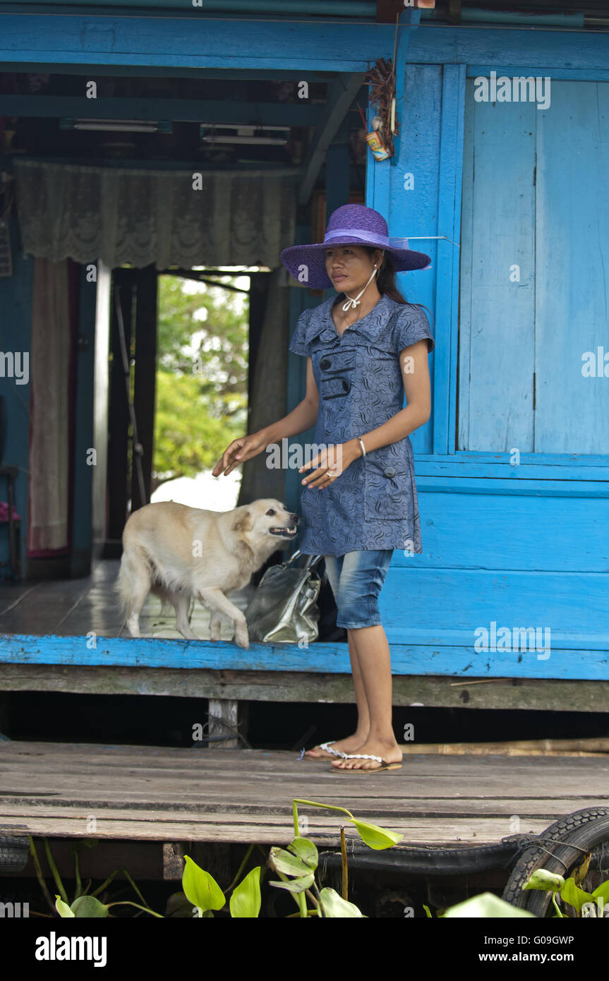 Elegant woman at the entrance to a floating house Stock Photo - Alamy