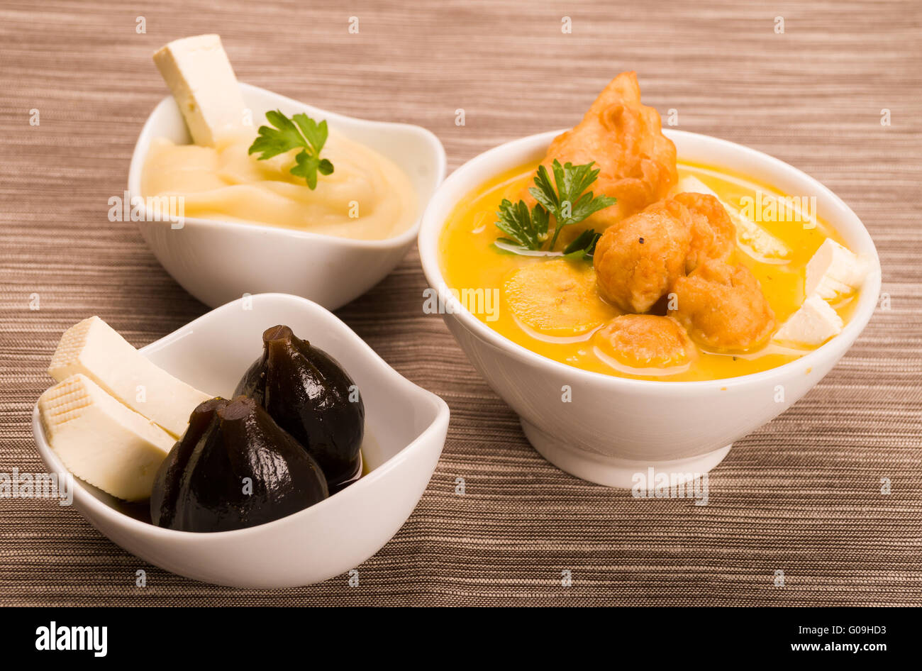 Traditional fanesca serving sitting on grey textile surface with ...