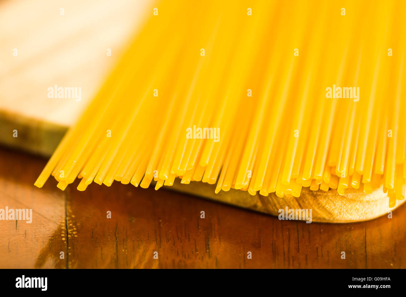 Closeup pile of dry spaghetti, yellow color and great detail Stock ...