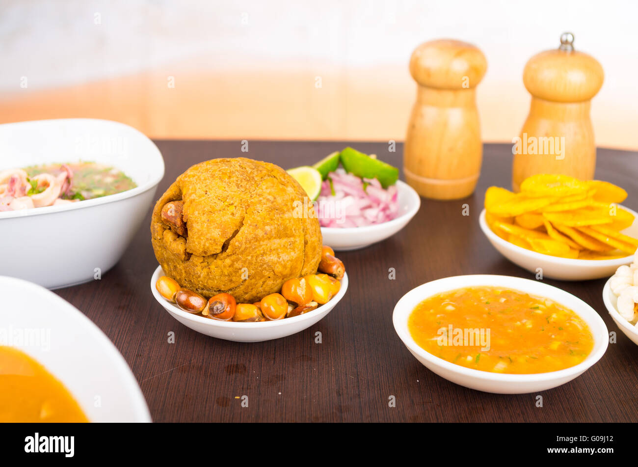 Traditional ecuadorian food, selective focus on bolon and fried corn ...