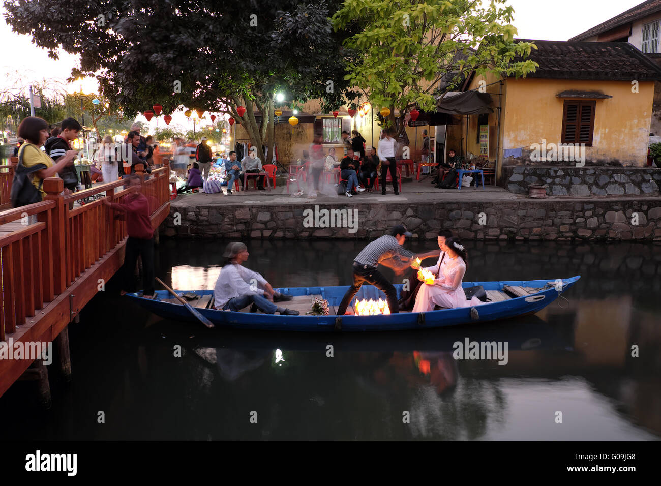 HOI AN, VIET NAM- FEB 17, 2016: Group of people travel Hoian old town ...