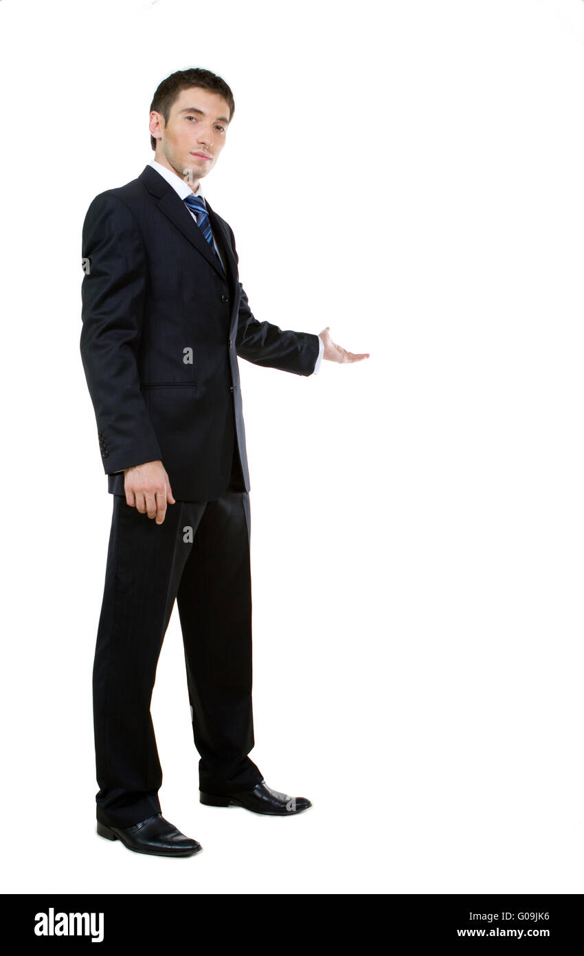 Businessman with arm out in a welcoming gesture Stock Photo - Alamy