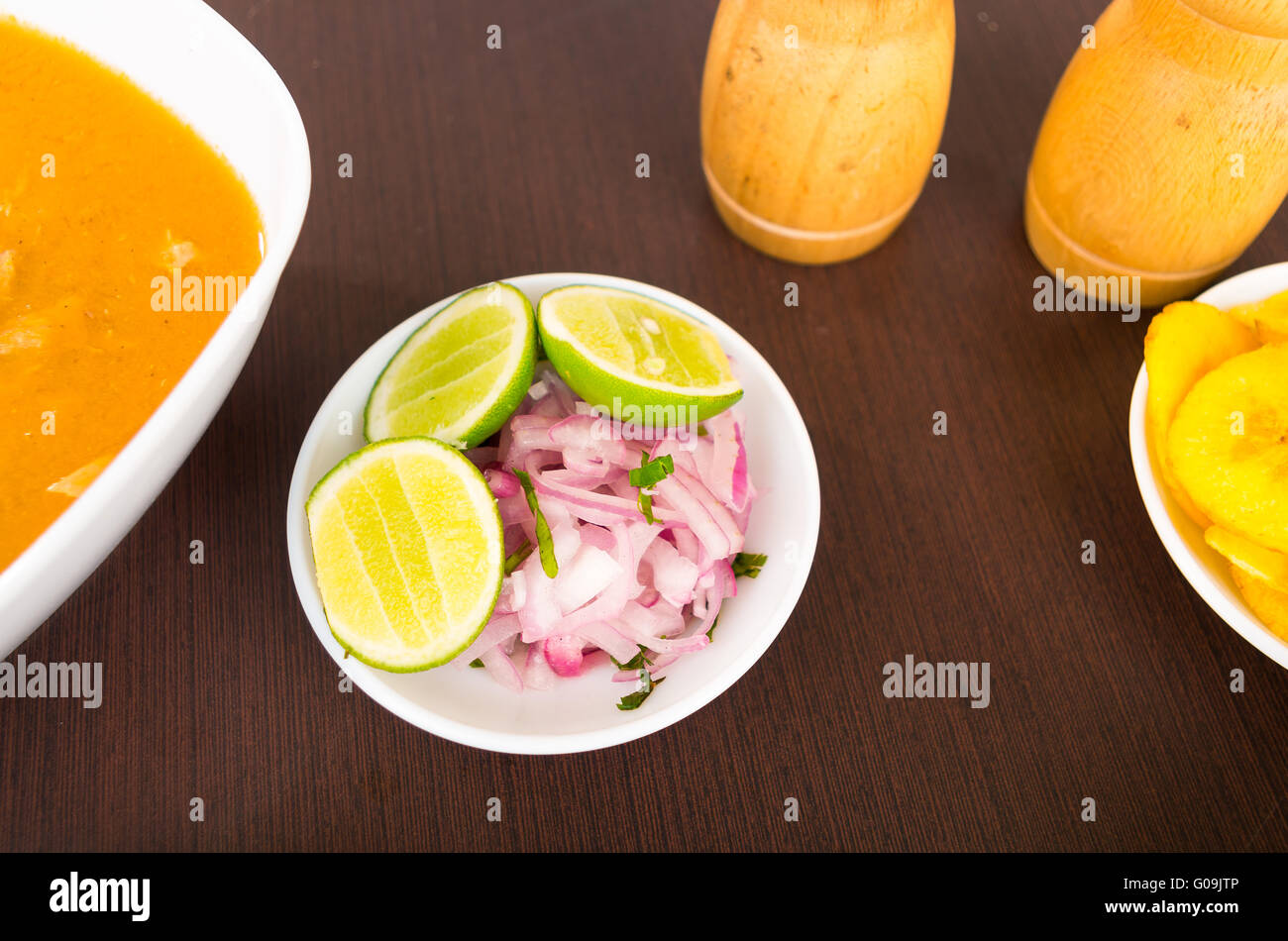 Chopped onions and lemon, side dish of fish soup Stock Photo - Alamy