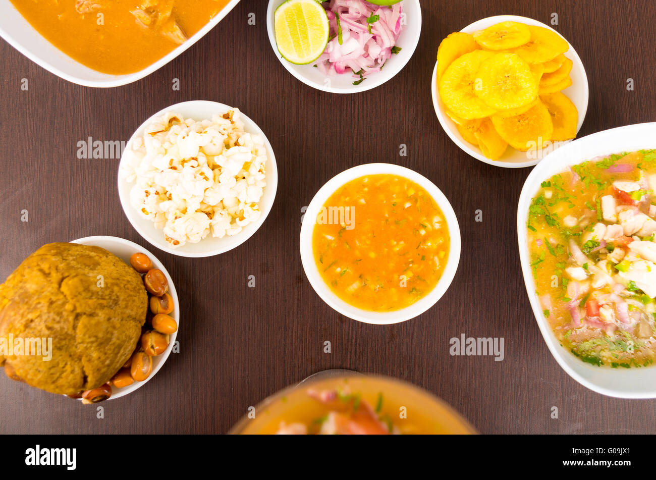 Delicious traditional food of Ecuador, aji, ceviche, pop corn, bolon ...