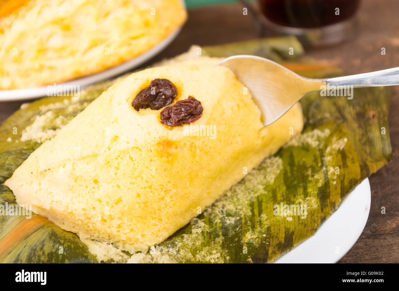 Fresh quimbolito ready to eat, with spoon on the middle. Traditional ...